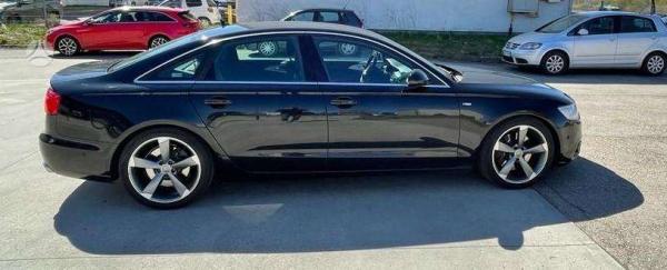 Black Audi A6 2013 in Vilnius, with an engine capacity of 2.97 L and mileage of 266 thousand km for 11295 €, photo 5 on AUTOMOTO.COM.LV