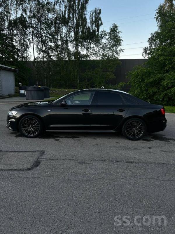 Black Audi A6 2013 in Riga, with an engine capacity of 3.00 L and mileage of 271 thousand km for 12300 €, photo 4 on AUTOMOTO.COM.LV