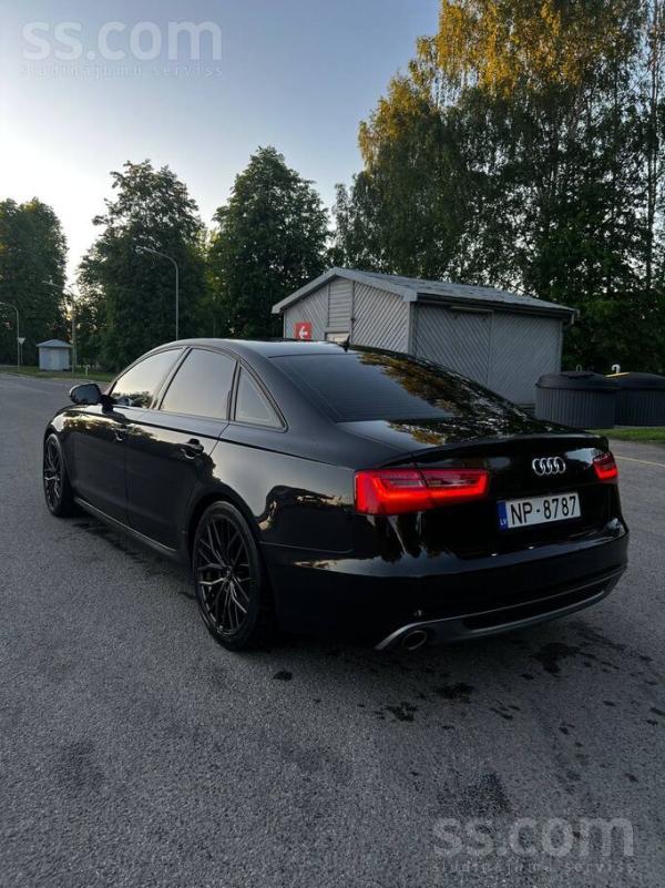Black Audi A6 2013 in Riga, with an engine capacity of 3.00 L and mileage of 271 thousand km for 12300 €, photo 8 on AUTOMOTO.COM.LV