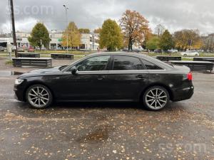 Black Audi A6 2013 in Riga, with an engine capacity of 2.80 L and mileage of 144 thousand km for 13000 €, photo 3 on AUTOMOTO.COM.LV