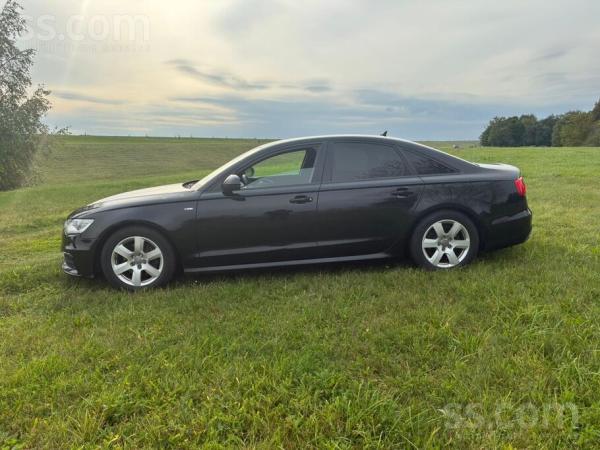 Black Audi A6 2013 in Riga, with an engine capacity of 2.00 L and mileage of 360 thousand km for 9000 €, photo 4 on AUTOMOTO.COM.LV