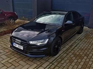 Black Audi A6 2013 in Riga, with an engine capacity of 3.00 L and mileage of 219 thousand km for 16100 €, photo 5 on AUTOMOTO.COM.LV