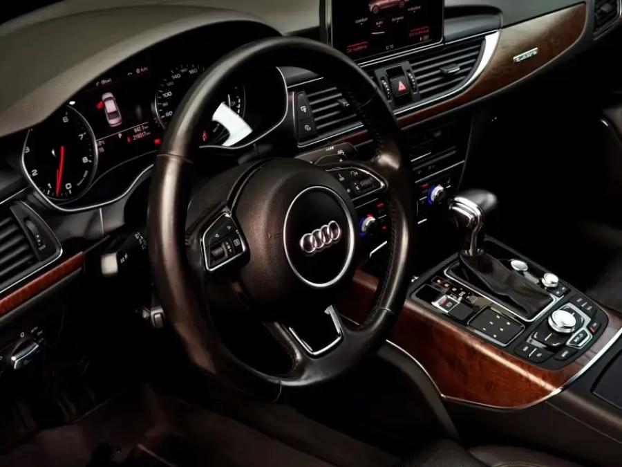 Black Audi A6 2013 in Riga, with an engine capacity of 3.00 L and mileage of 219 thousand km for 16100 €, photo 12 on AUTOMOTO.COM.LV