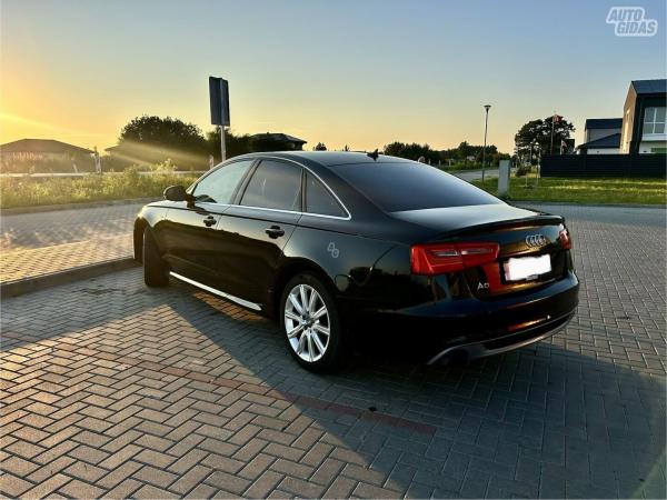 Black Audi A6 2013 in Klaipeda, with an engine capacity of 2.00 L and mileage of 242 thousand km for 6300 €, photo 4 on AUTOMOTO.COM.LV
