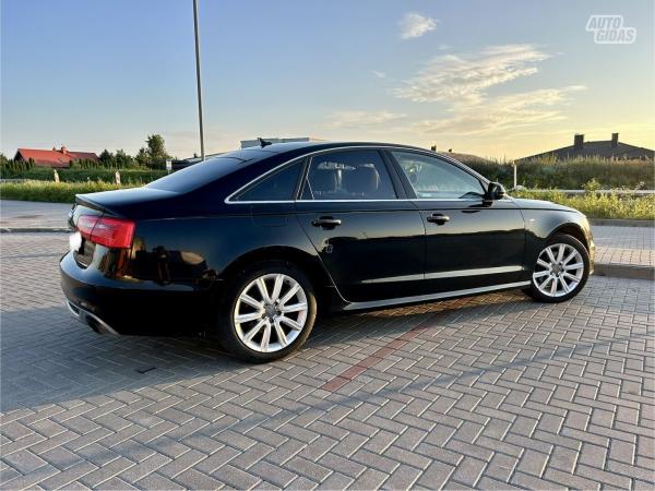 Black Audi A6 2013 in Klaipeda, with an engine capacity of 2.00 L and mileage of 242 thousand km for 6300 €, photo 6 on AUTOMOTO.COM.LV