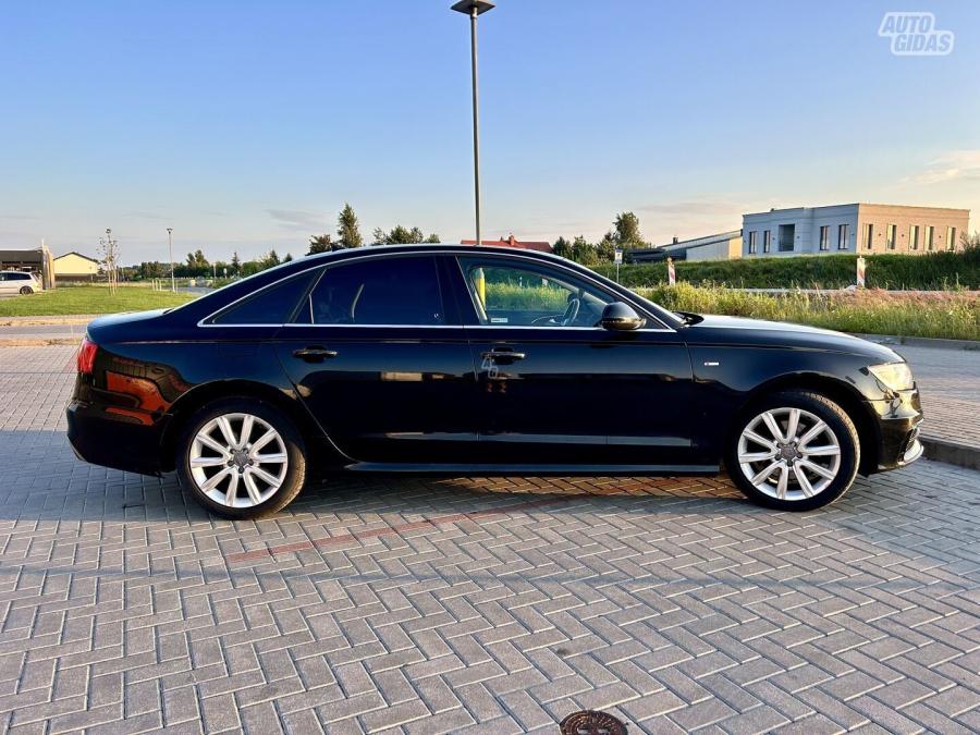 Black Audi A6 2013 in Klaipeda, with an engine capacity of 2.00 L and mileage of 242 thousand km for 6300 €, photo 8 on AUTOMOTO.COM.LV