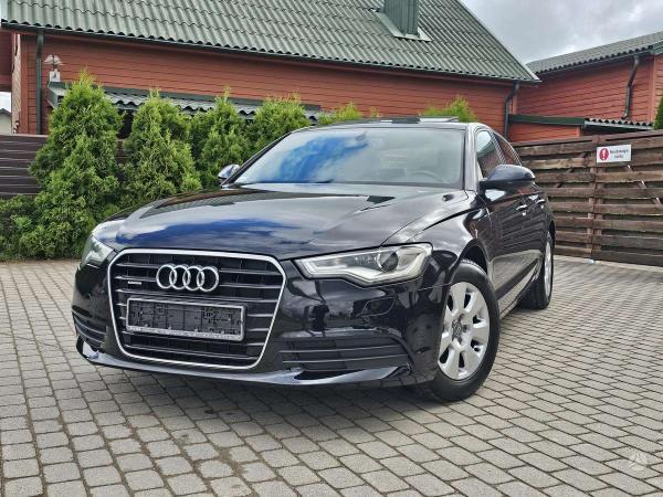 Black Audi A6 2013 in Kretinga, with an engine capacity of 2.97 L and mileage of 298 thousand km for 10899 €, photo 2 on AUTOMOTO.COM.LV