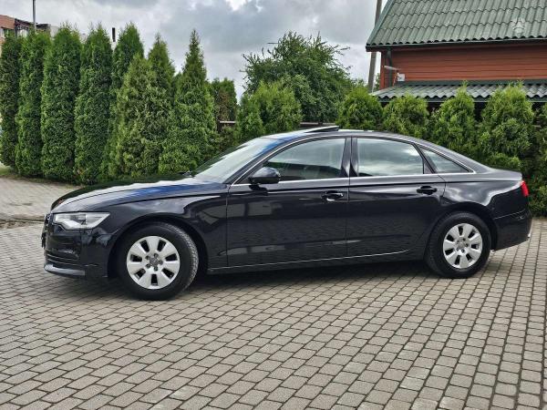 Black Audi A6 2013 in Kretinga, with an engine capacity of 2.97 L and mileage of 298 thousand km for 10899 €, photo 3 on AUTOMOTO.COM.LV