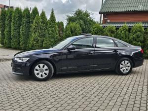 Black Audi A6 2013 in Kretinga, with an engine capacity of 2.97 L and mileage of 298 thousand km for 10899 €, photo 4 on AUTOMOTO.COM.LV