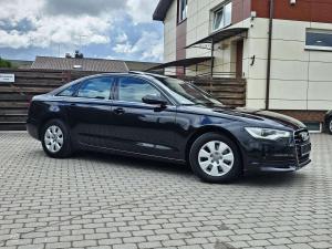 Black Audi A6 2013 in Kretinga, with an engine capacity of 2.97 L and mileage of 298 thousand km for 10899 €, photo 6 on AUTOMOTO.COM.LV