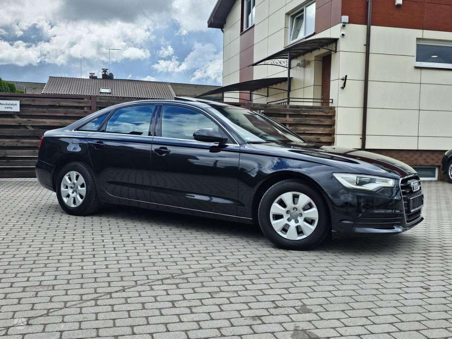 Black Audi A6 2013 in Kretinga, with an engine capacity of 2.97 L and mileage of 298 thousand km for 10899 €, photo 6 on AUTOMOTO.COM.LV