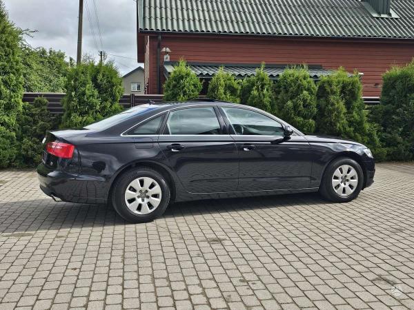 Black Audi A6 2013 in Kretinga, with an engine capacity of 2.97 L and mileage of 298 thousand km for 10899 €, photo 10 on AUTOMOTO.COM.LV