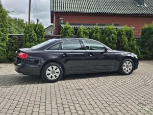 Black Audi A6 2013 in Kretinga, with an engine capacity of 2.97 L and mileage of 298 thousand km for 10899 €, photo 11 on AUTOMOTO.COM.LV
