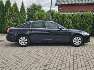 Black Audi A6 2013 in Kretinga, with an engine capacity of 2.97 L and mileage of 298 thousand km for 10899 €, photo 12 on AUTOMOTO.COM.LV
