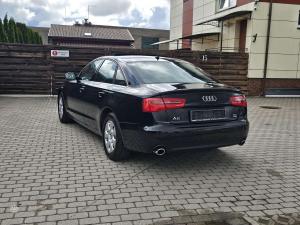 Black Audi A6 2013 in Kretinga, with an engine capacity of 2.97 L and mileage of 298 thousand km for 10899 €, photo 14 on AUTOMOTO.COM.LV