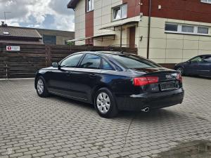 Black Audi A6 2013 in Kretinga, with an engine capacity of 2.97 L and mileage of 298 thousand km for 10899 €, photo 15 on AUTOMOTO.COM.LV