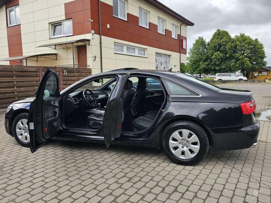 Black Audi A6 2013 in Kretinga, with an engine capacity of 2.97 L and mileage of 298 thousand km for 10899 €, photo 16 on AUTOMOTO.COM.LV