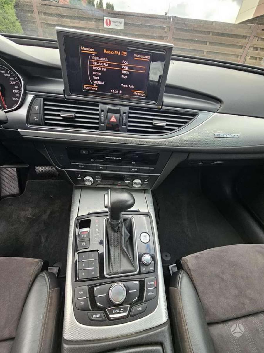 Black Audi A6 2013 in Kretinga, with an engine capacity of 2.97 L and mileage of 298 thousand km for 10899 €, photo 26 on AUTOMOTO.COM.LV