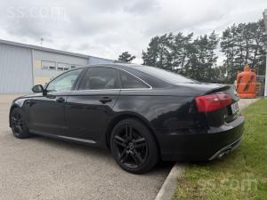 Black Audi A6 2013 in Riga, with an engine capacity of 2.00 L and mileage of 220 thousand km for 12400 €, photo 5 on AUTOMOTO.COM.LV
