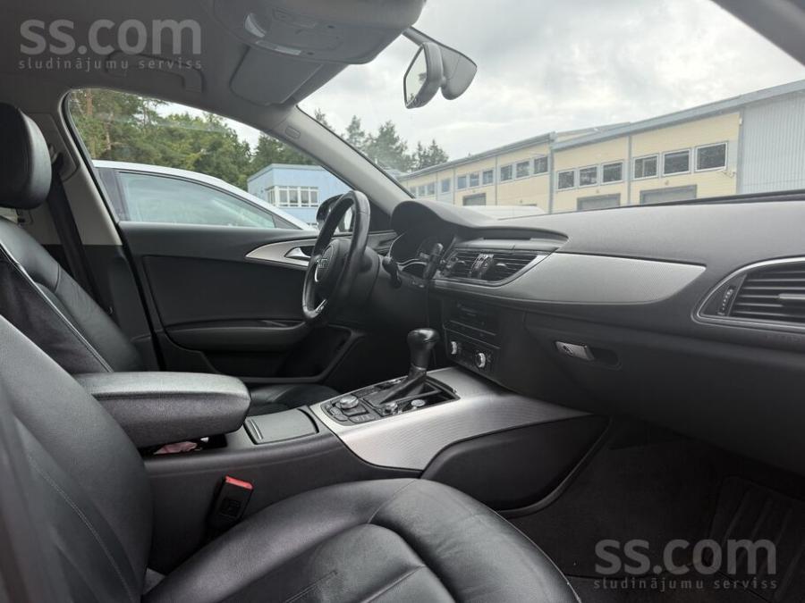 Black Audi A6 2013 in Riga, with an engine capacity of 2.00 L and mileage of 220 thousand km for 12400 €, photo 9 on AUTOMOTO.COM.LV