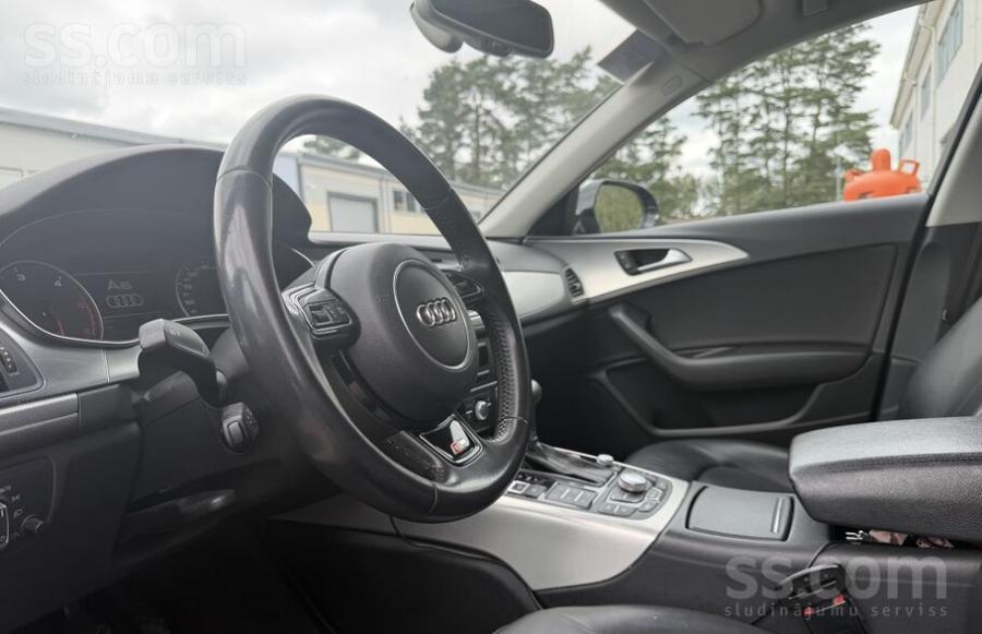 Black Audi A6 2013 in Riga, with an engine capacity of 2.00 L and mileage of 220 thousand km for 12400 €, photo 10 on AUTOMOTO.COM.LV