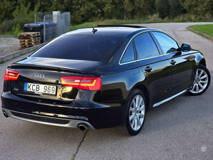 Black Audi A6 2013 in Radviliskis, with an engine capacity of 0.00 L and mileage of 243 thousand km for 8700 €, photo 7 on AUTOMOTO.COM.LV