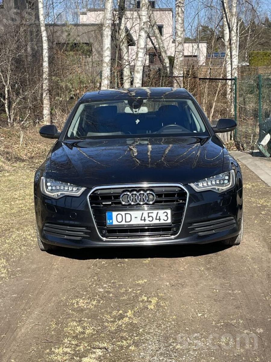 Black Audi A6 2014 in Riga, with an engine capacity of 3.00 L and mileage of 305 thousand km for 12500 €, photo 1 on AUTOMOTO.COM.LV