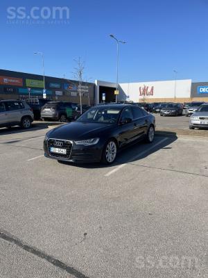 Black Audi A6 2014 in Riga, with an engine capacity of 3.00 L and mileage of 305 thousand km for 12500 €, photo 6 on AUTOMOTO.COM.LV