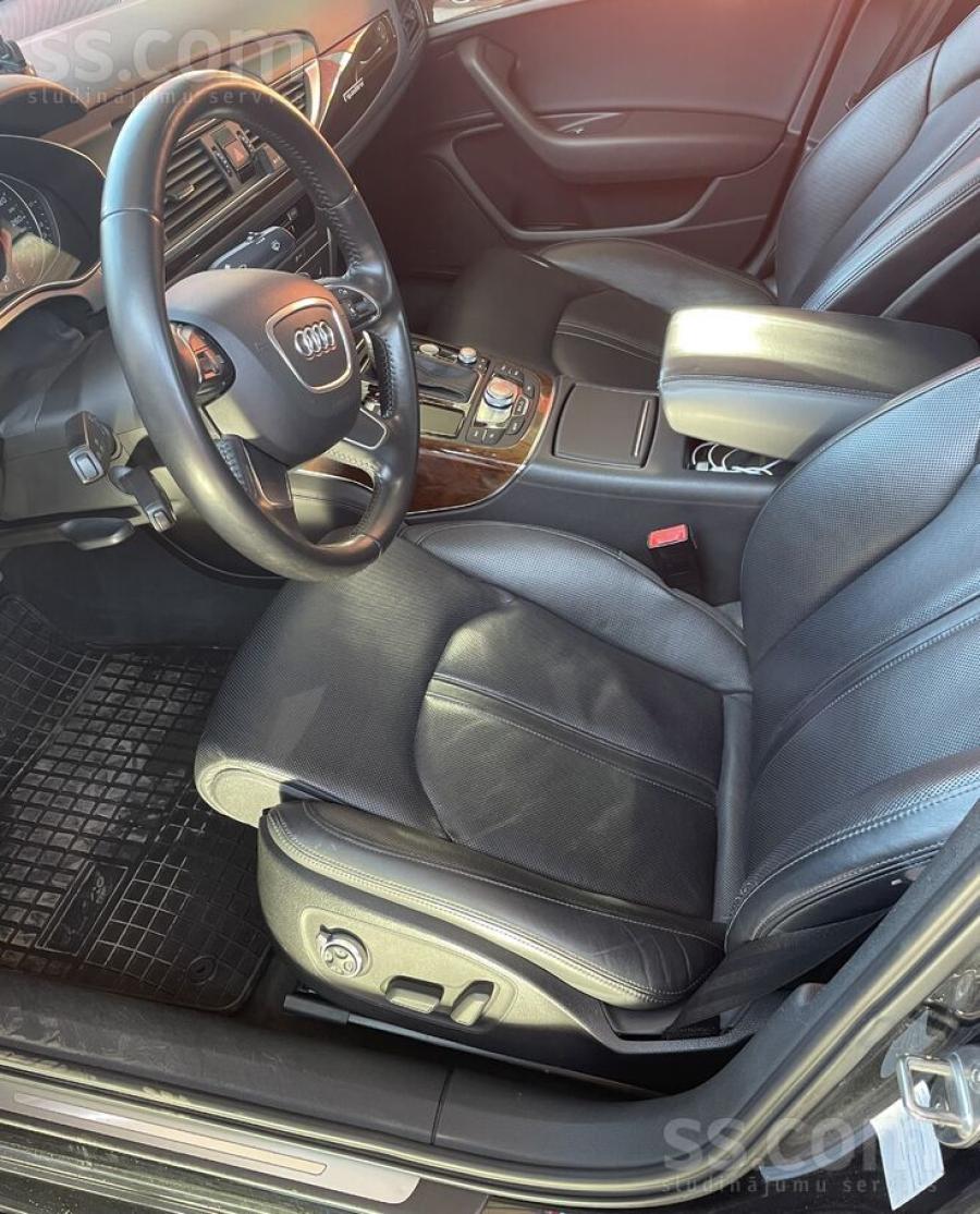 Black Audi A6 2014 in Riga, with an engine capacity of 3.00 L and mileage of 305 thousand km for 12500 €, photo 7 on AUTOMOTO.COM.LV