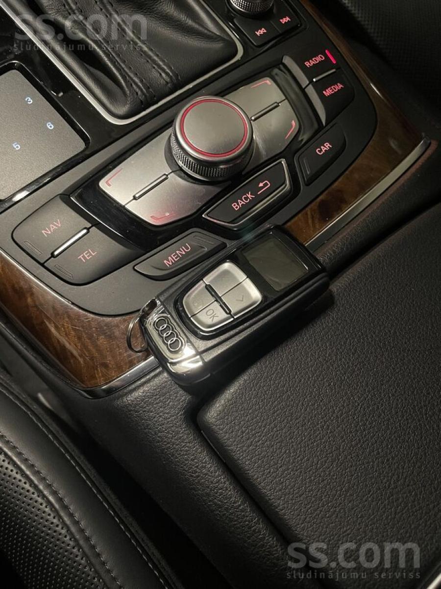 Black Audi A6 2014 in Riga, with an engine capacity of 3.00 L and mileage of 305 thousand km for 12500 €, photo 14 on AUTOMOTO.COM.LV