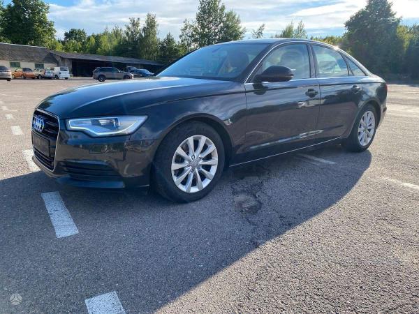 Black Audi A6 2014 in Raseiniai, with an engine capacity of 1.97 L and mileage of 359 thousand km for 7300 €, photo 1 on AUTOMOTO.COM.LV