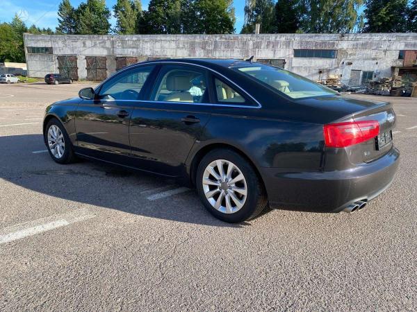Black Audi A6 2014 in Raseiniai, with an engine capacity of 1.97 L and mileage of 359 thousand km for 7300 €, photo 3 on AUTOMOTO.COM.LV