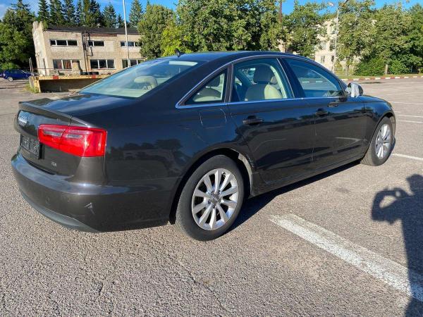 Black Audi A6 2014 in Raseiniai, with an engine capacity of 1.97 L and mileage of 359 thousand km for 7300 €, photo 4 on AUTOMOTO.COM.LV