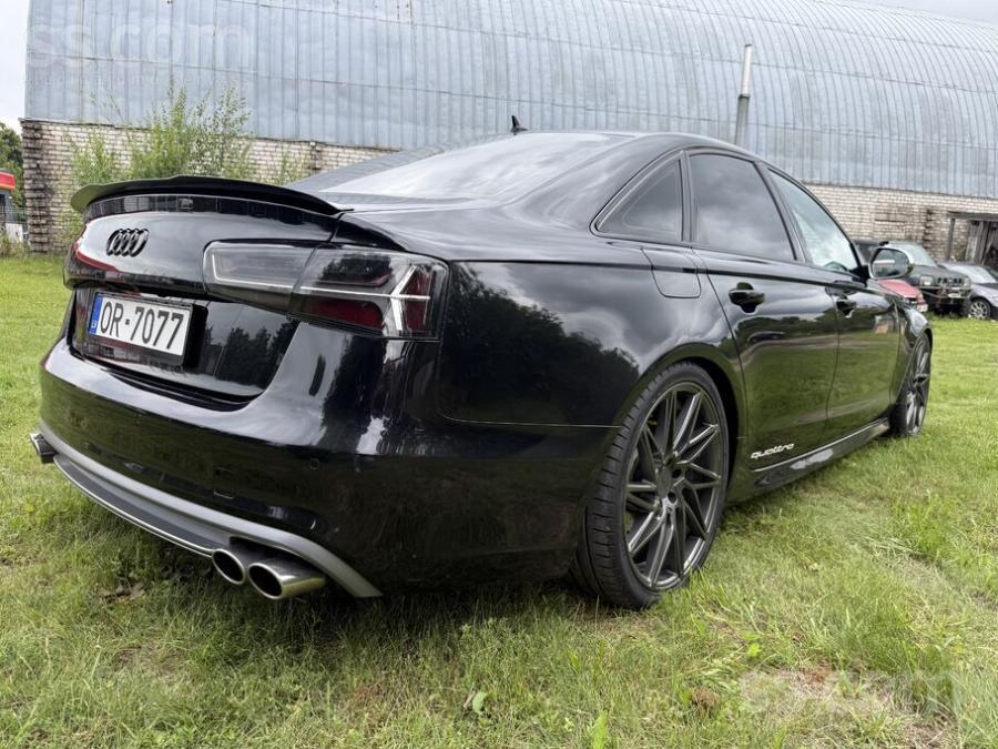 Melns Audi A6 2014 Rīga, ar dzinēja tilpumu 3.00 L un nobraukumu 263 tūkst. km par 15200 €, foto 22 vietnē AUTOMOTO.COM.LV