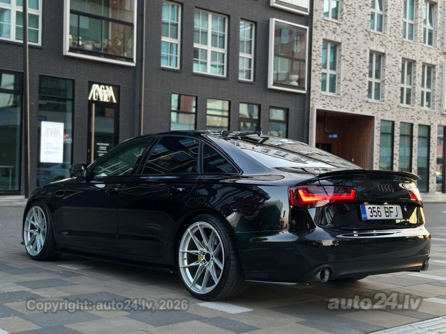 Melns Audi A6 2014 Tallina, ar dzinēja tilpumu 3.00 L un nobraukumu 342 tūkst. km par 12000 €, foto 8 vietnē AUTOMOTO.COM.LV