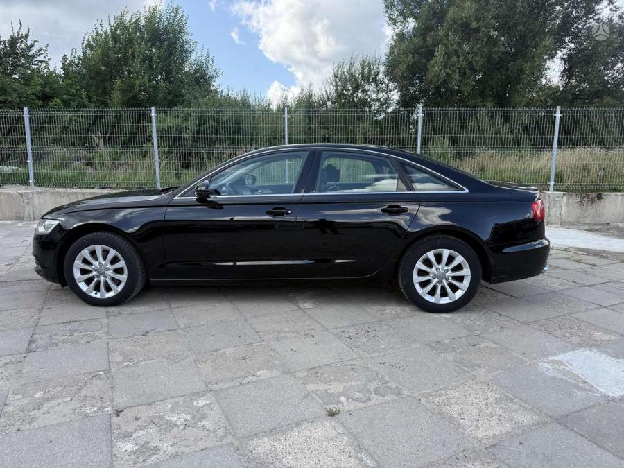 Black Audi A6 2014 in Telschi, with an engine capacity of 1.97 L and mileage of 268 thousand km for 9000 €, photo 6 on AUTOMOTO.COM.LV
