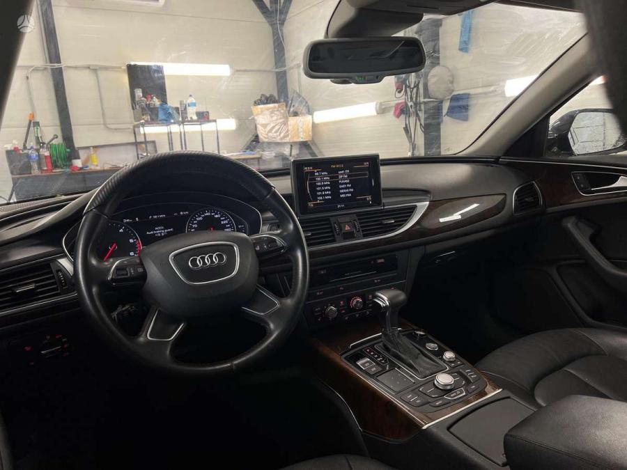 Black Audi A6 2014 in Vilnius, with an engine capacity of 2.97 L and mileage of 315 thousand km for 9317 €, photo 22 on AUTOMOTO.COM.LV