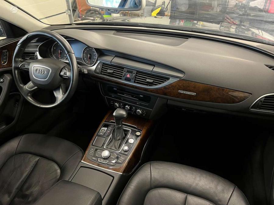 Black Audi A6 2014 in Vilnius, with an engine capacity of 2.97 L and mileage of 315 thousand km for 9317 €, photo 32 on AUTOMOTO.COM.LV