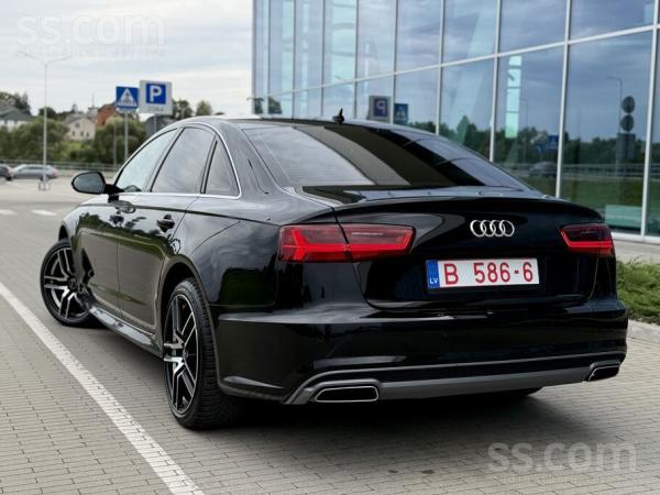 Black Audi A6 2015 in Rezekne, with an engine capacity of 2.00 L and mileage of 264 thousand km for 13990 €, photo 4 on AUTOMOTO.COM.LV