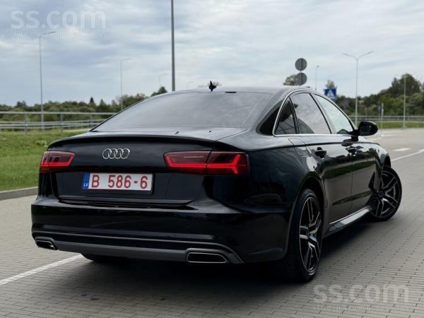 Black Audi A6 2015 in Rezekne, with an engine capacity of 2.00 L and mileage of 264 thousand km for 13990 €, photo 5 on AUTOMOTO.COM.LV