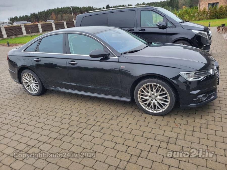 Black Audi A6 2015 in Tallinn, with an engine capacity of 3.00 L and mileage of 225 thousand km for 15900 €, photo 18 on AUTOMOTO.COM.LV