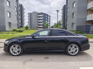 Black Audi A6 2015 in Riga, with an engine capacity of 3.00 L and mileage of 167 thousand km for 14900 €, photo  on AUTOMOTO.COM.LV