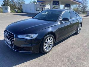Black Audi A6 2015 in Kazlu Ruda, with an engine capacity of 1.97 L and mileage of 268 thousand km for 9350 €, photo 4 on AUTOMOTO.COM.LV