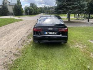 Black Audi A6 2015 in Kaunas, with an engine capacity of 1.97 L and mileage of 280 thousand km for 11500 €, photo 6 on AUTOMOTO.COM.LV