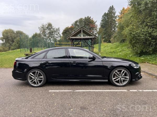 Melns Audi A6 2015 Rīga, ar dzinēja tilpumu 3.00 L un nobraukumu 256 tūkst. km par 14444 €, foto 9 vietnē AUTOMOTO.COM.LV