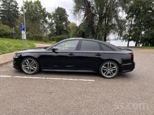Melns Audi A6 2015 Rīga, ar dzinēja tilpumu 3.00 L un nobraukumu 256 tūkst. km par 14444 €, foto 12 vietnē AUTOMOTO.COM.LV