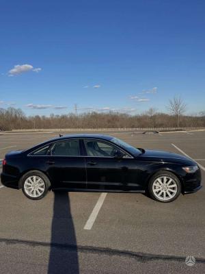 Black Audi A6 2016 in Klaipeda, with an engine capacity of 1.98 L and mileage of 176 thousand km for 12500 €, photo 4 on AUTOMOTO.COM.LV