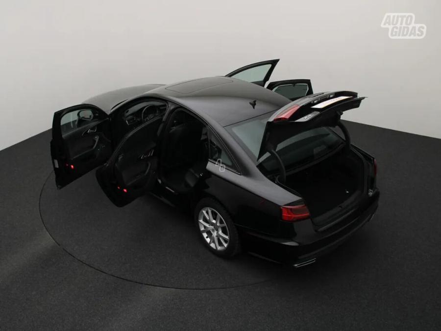 Black Audi A6 2016 in Vilnius, with an engine capacity of 3.00 L and mileage of 249 thousand km for 15599 €, photo 14 on AUTOMOTO.COM.LV