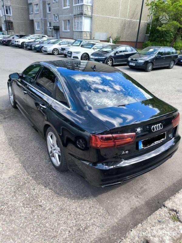 Black Audi A6 2016 in Vilnius, with an engine capacity of 3.00 L and mileage of 200 thousand km for 14900 €, photo 4 on AUTOMOTO.COM.LV