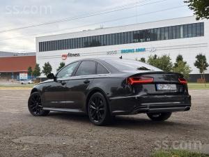 Melns Audi A6 2016 Rīga, ar dzinēja tilpumu 2.00 L un nobraukumu 171 tūkst. km par 19300 €, foto  vietnē AUTOMOTO.COM.LV